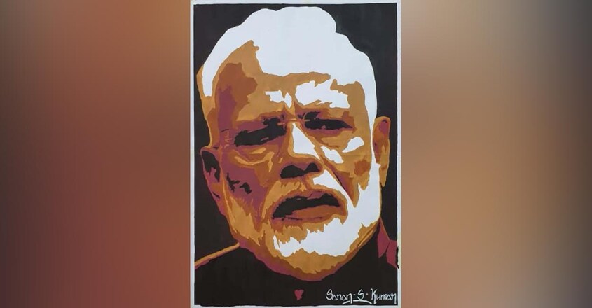 അമ്മയുടെ തോളിലേക്ക് ചാഞ്ഞ് ചെറുപുഞ്ചിരിയോടെ ലാലേട്ടൻ മണലിൽ തീർത്ത ...