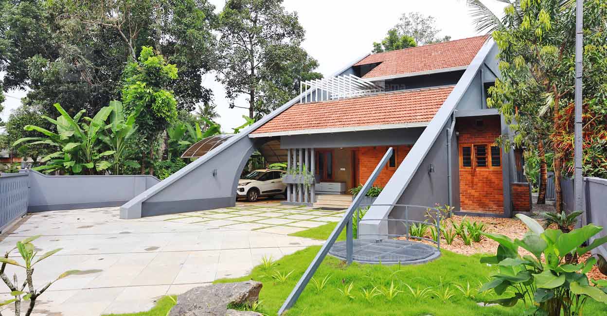 ഇങ്ങനെയൊരു വീട് കണ്ടിട്ടുണ്ടോ! വ്യത്യസ്തമായ ആകൃതിയിൽ ശ്രദ്ധനേടുന്ന വീട്