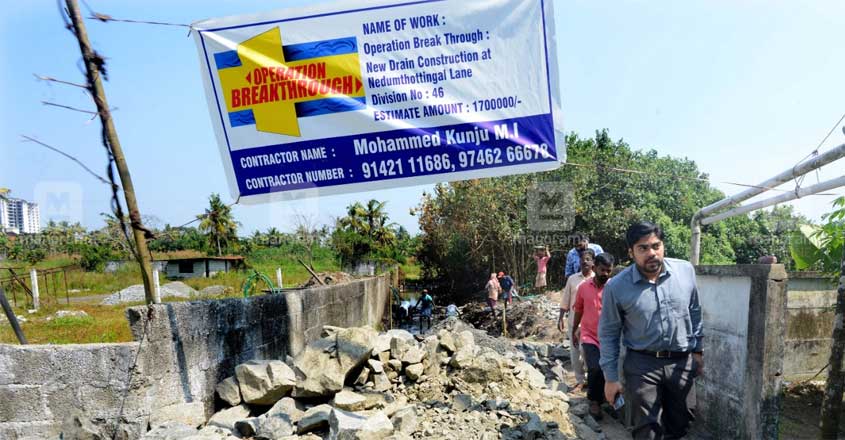 മതിലുകൾ പൊളിച്ച് കനാലുകൾ വൃത്തിയാക്കി കലക്ടറും സംഘവും; കൊച്ചിയ്ക്ക് ...